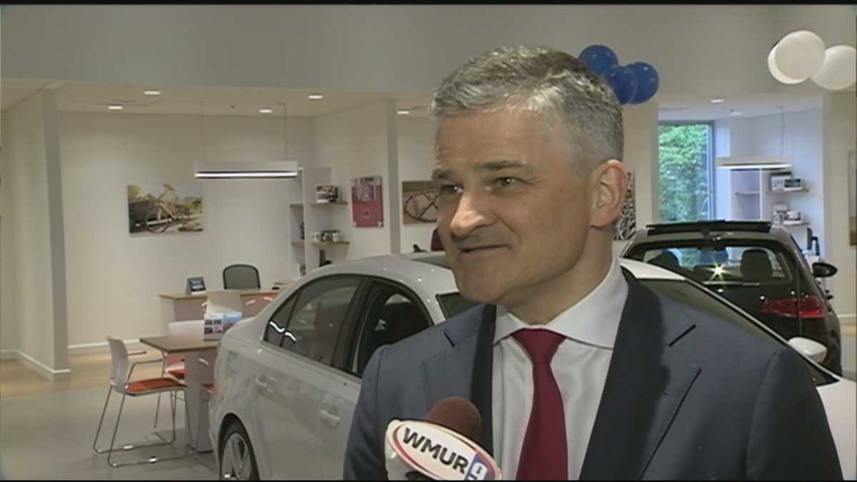 Volkswagen CEO takes part in ribbon-cutting at new Nashua dealership