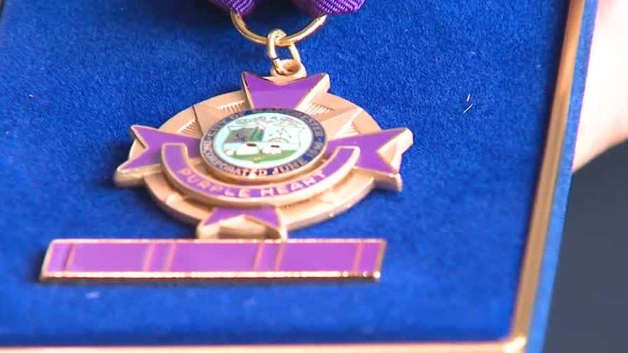 Manchester Police honor 12 officers with Purple Heart Medals