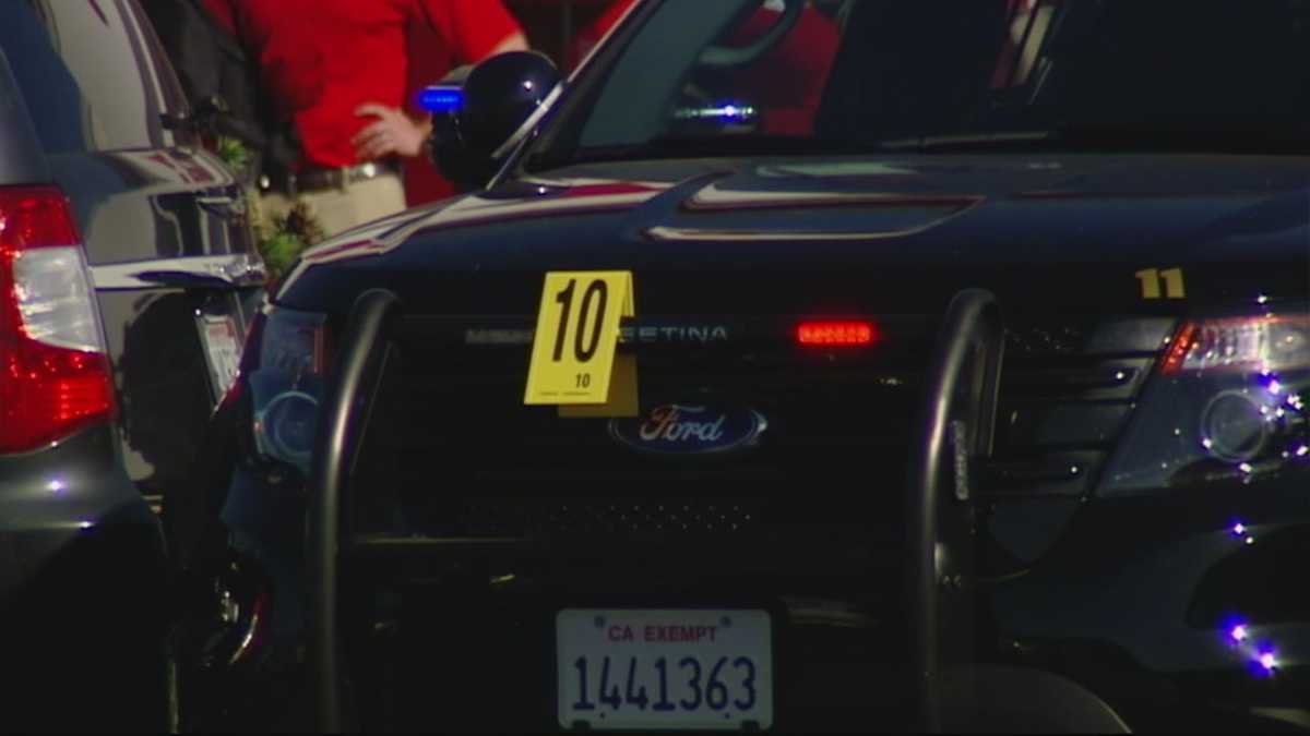 Two people are dead after shootout in Target parking lot