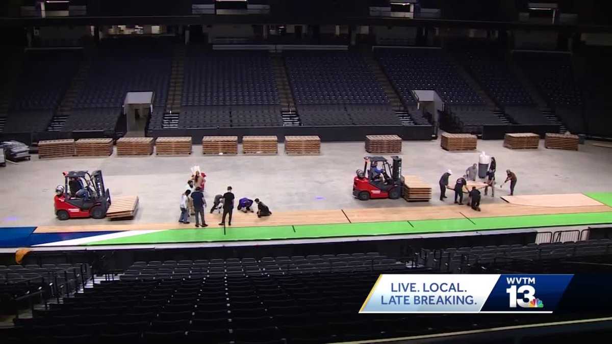 Crews begin laying NCAA Tournament court at Legacy Arena