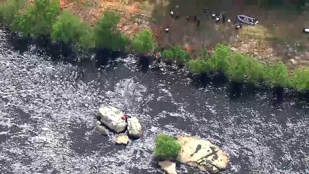 Man stranded on rock in Merrimack River rescued