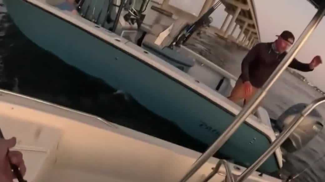 Florida boater seen in video yelling at young fisherman arrested