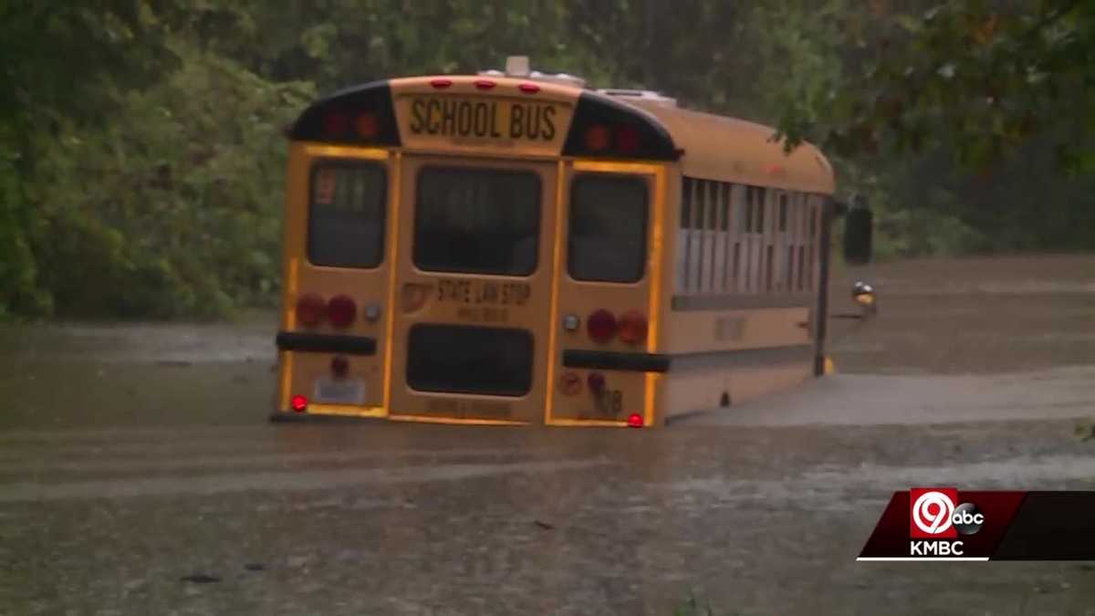 Students rescued from bus stranded in flood water