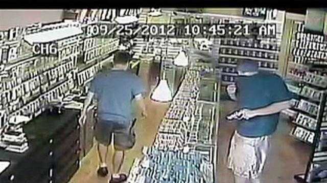 Game store owner fights back against thief