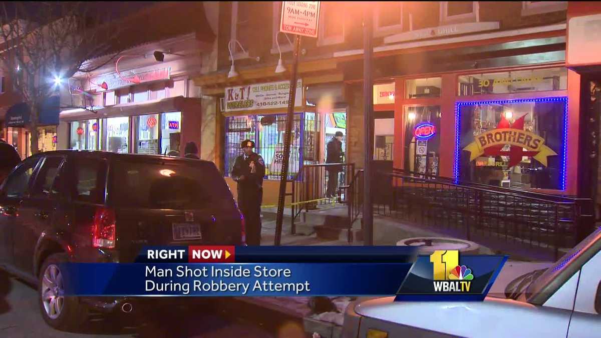 Video: Man shot inside store during robbery attempt