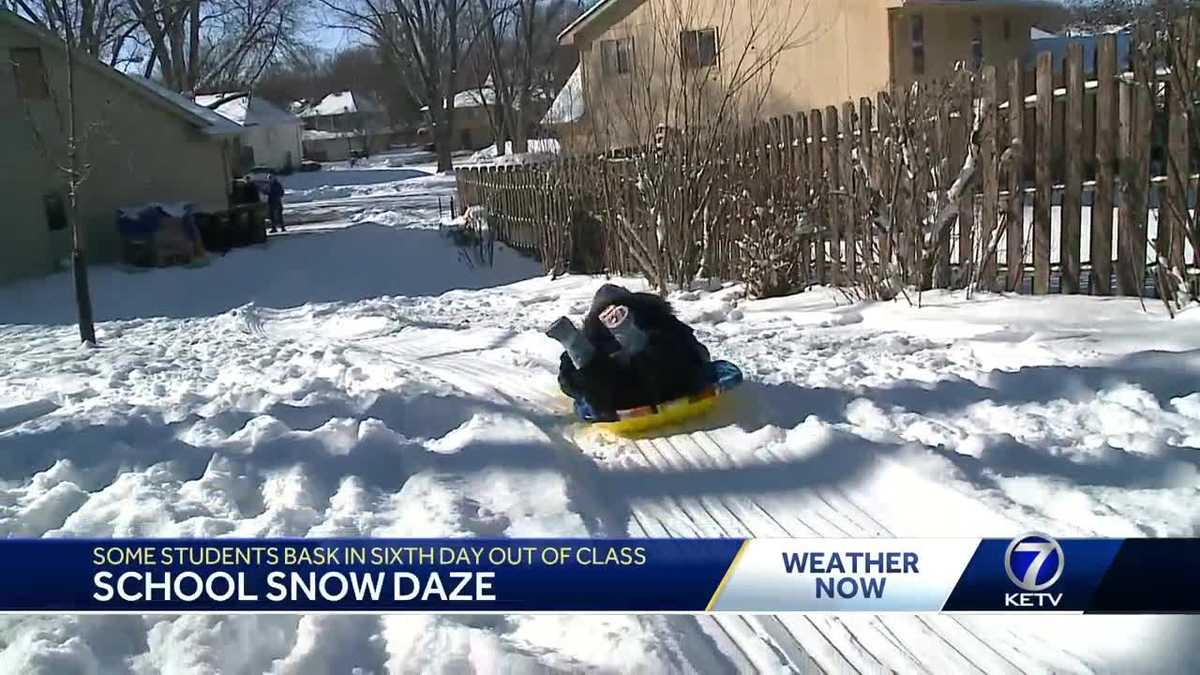Students, parents feel 'snow daze' basking in sixth day out of class