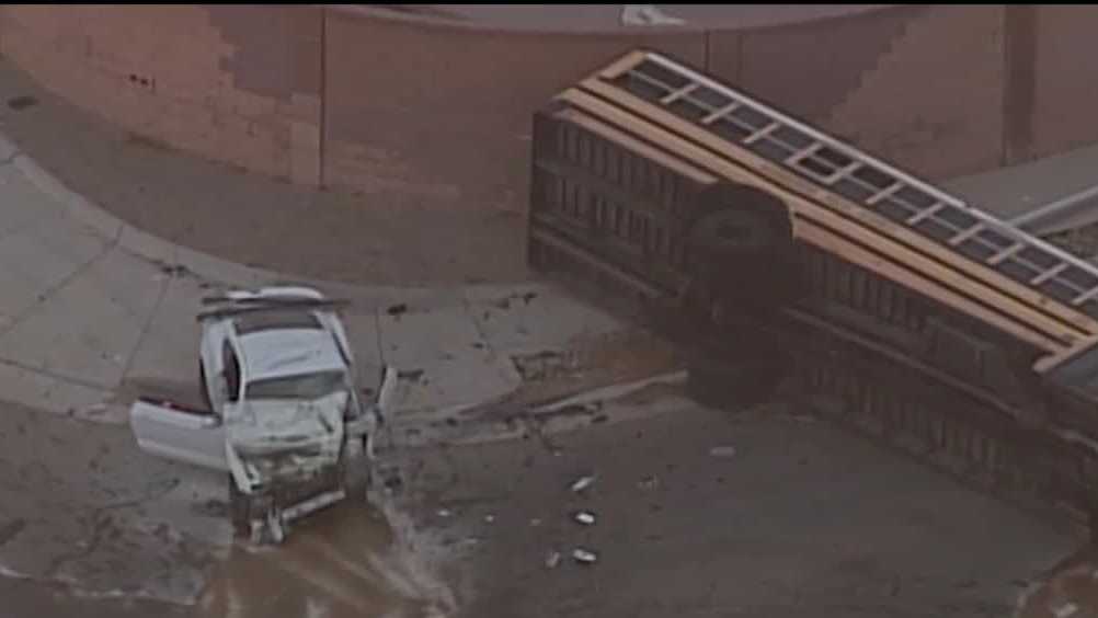 APD: Man was street racing when he crashed into school bus, flipping it ...