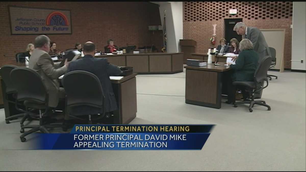 Former principal challenges termination