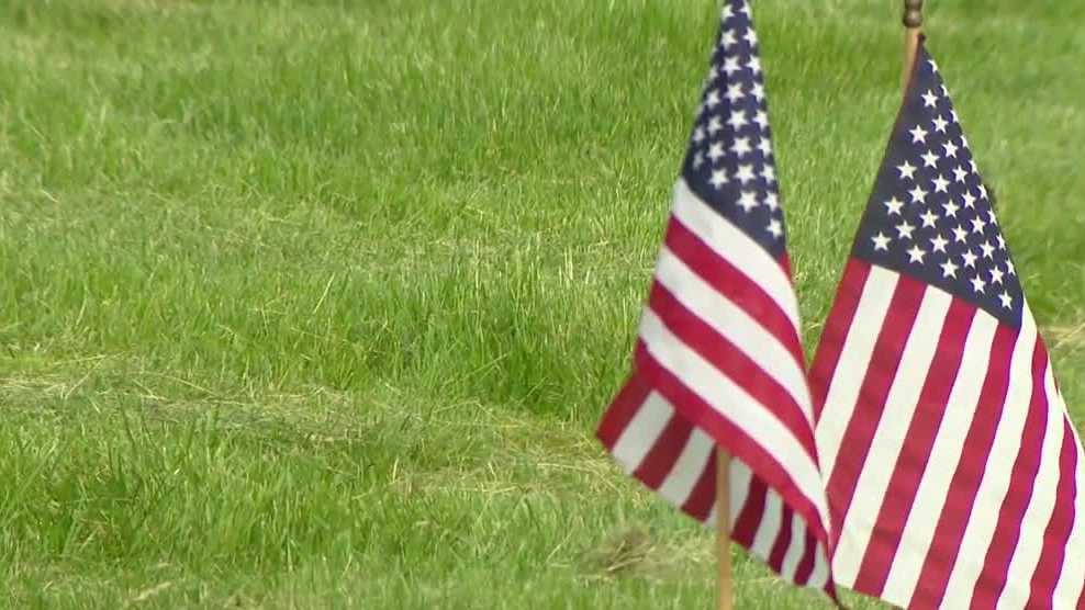 Flags placed on graves at Omaha cemetery in honor of Memorial Day