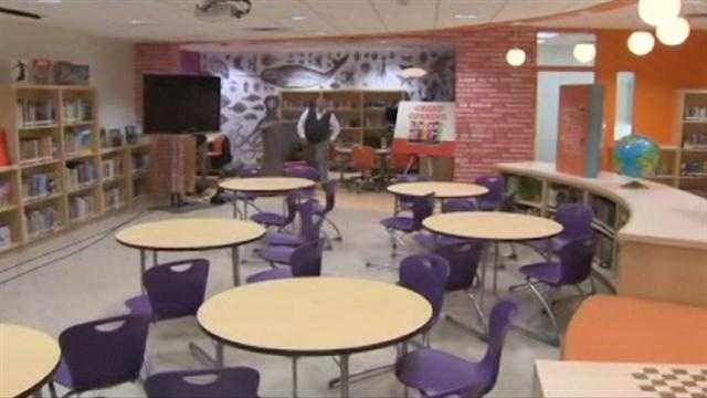 Ava visits 1 of 3 new city school libraries