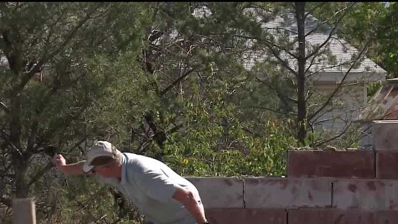 Neighbors lend a hand in cleaning up mess after deadly crash