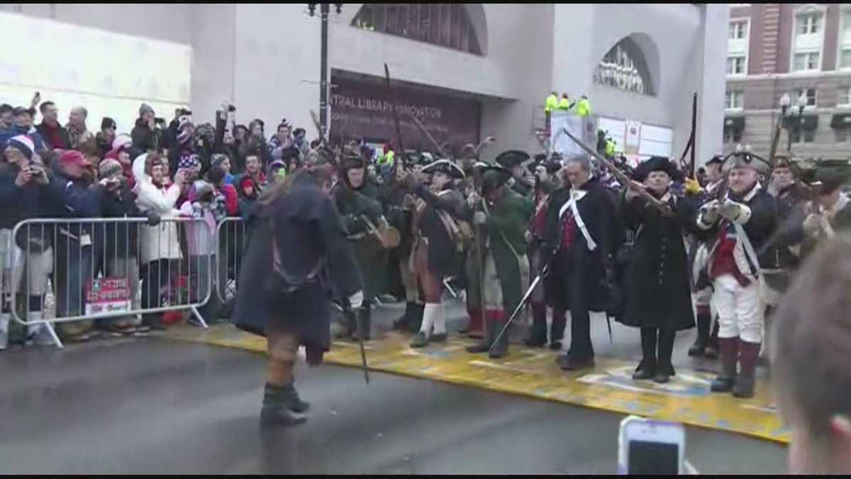 Patriots musket men stop at the Boston Marathon finish line