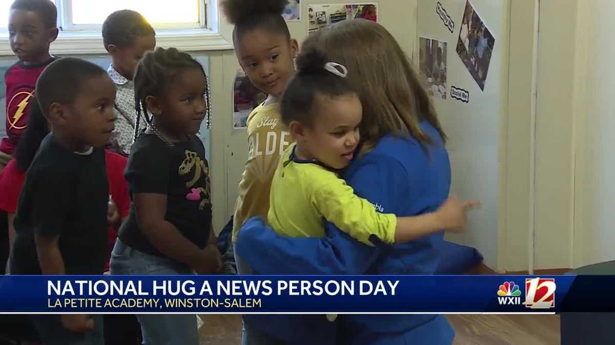 WXII takes part in #NationalHugaNewspersonDay