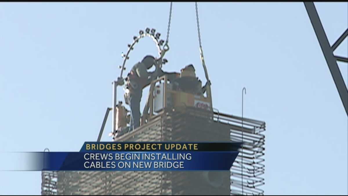 Crews begin installing cables on new bridge