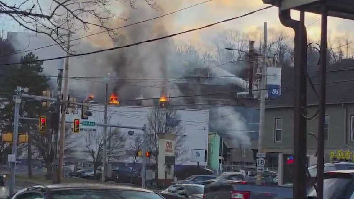 Flames deemed under control after fire broke out inside glass plant in ...
