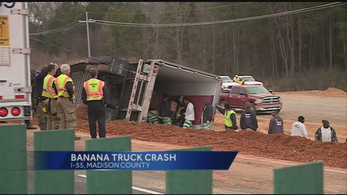 Banana truck overturns