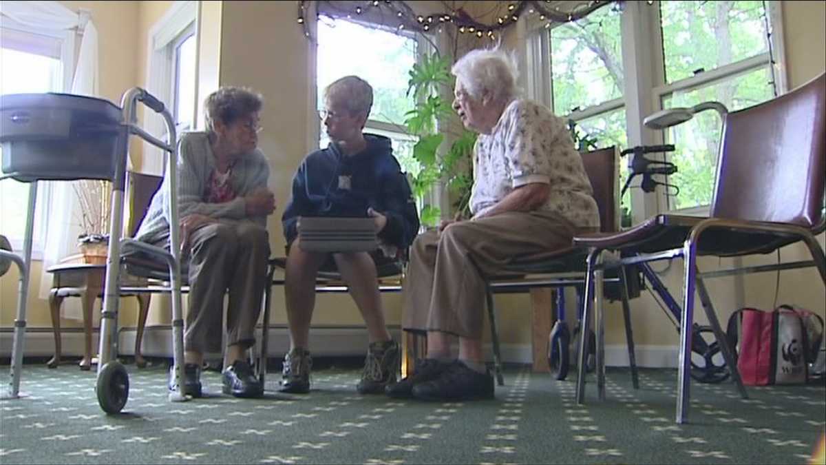 Middle school students teach senior citizens