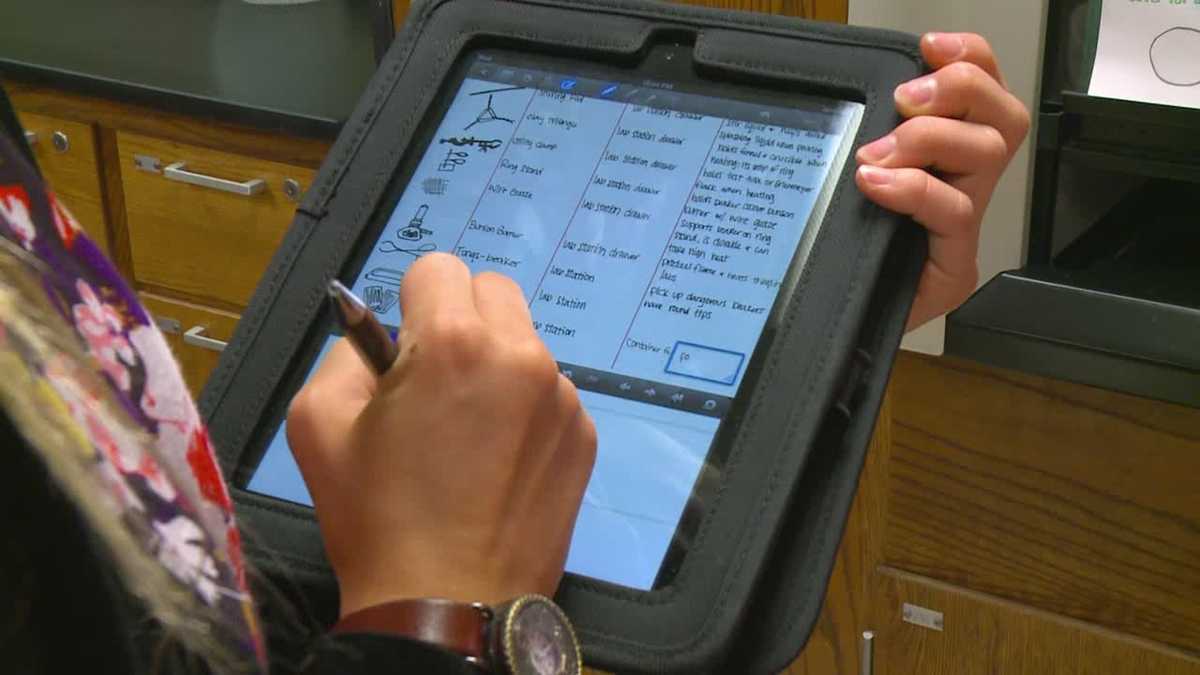 School hands iPads to every student