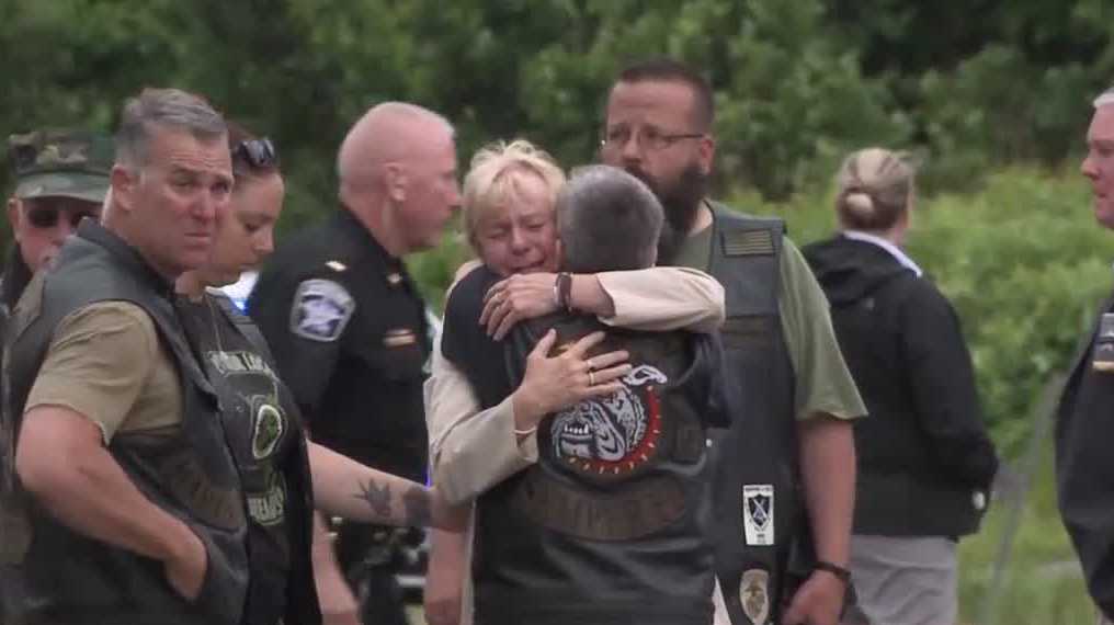 Residents, victims' relatives visit scene of fatal motorcycle crash