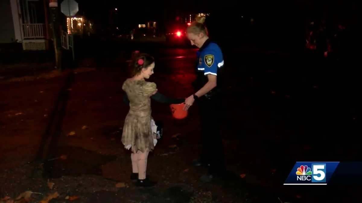 Police hand out candy to trick-or-treaters