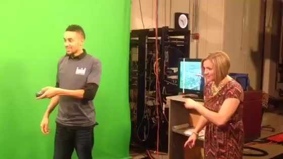 Reds' Billy Hamilton tries out the weather green screen with Randi Rico