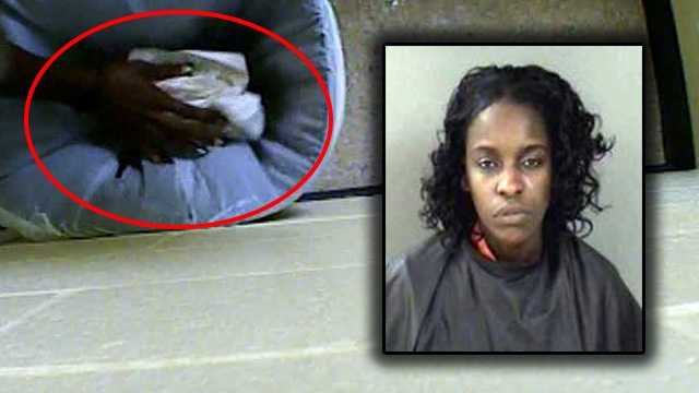 Security footage captures woman smuggling contraband into jail