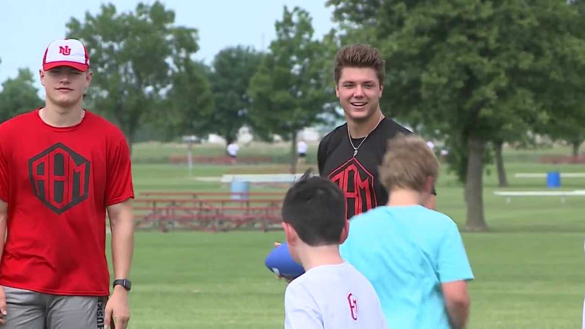 Husker football players host kids camp