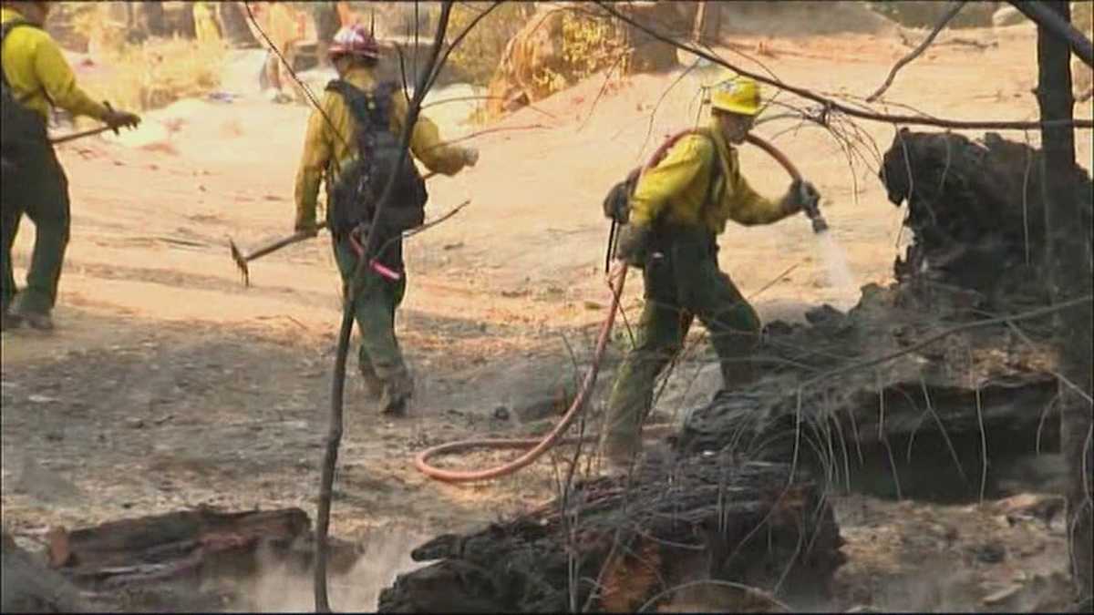 Yosemite fire grows, but crews report progress