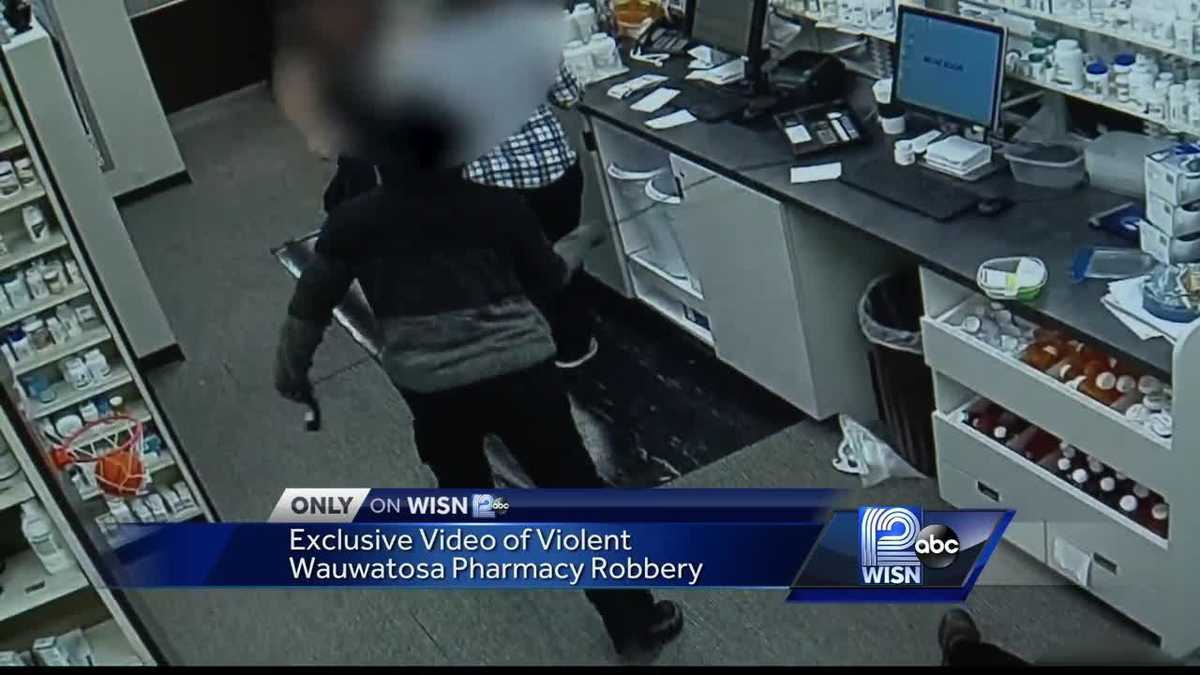 Surveillance video shows violent pharmacy robbery