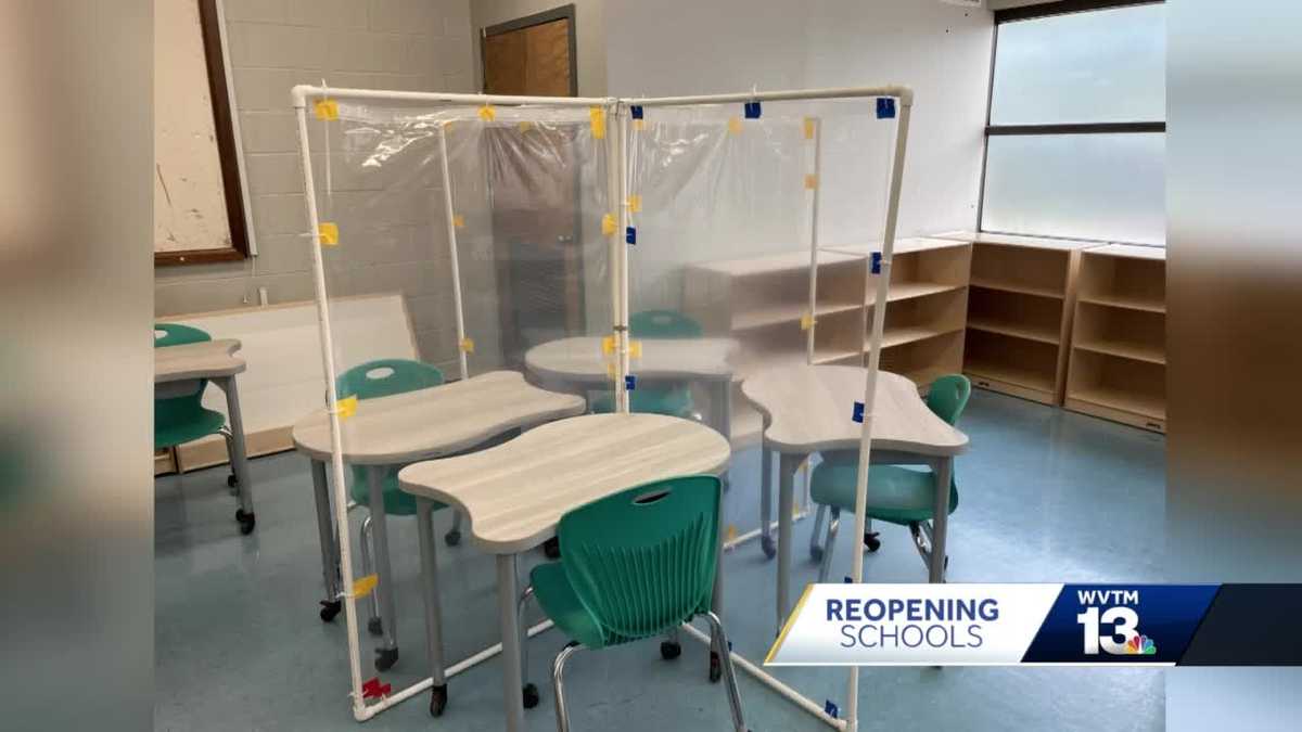 Some schools implementing desk partitions to keep students safe