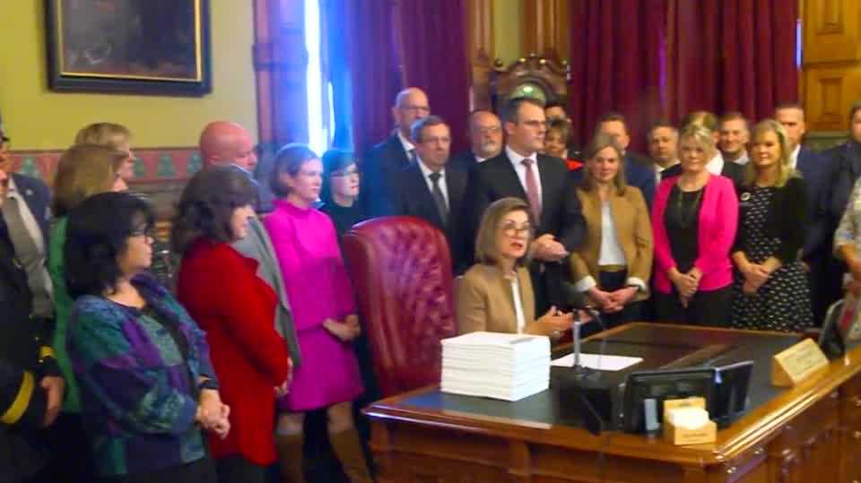 Gov. Reynolds' state government restructuring plan signed into law.