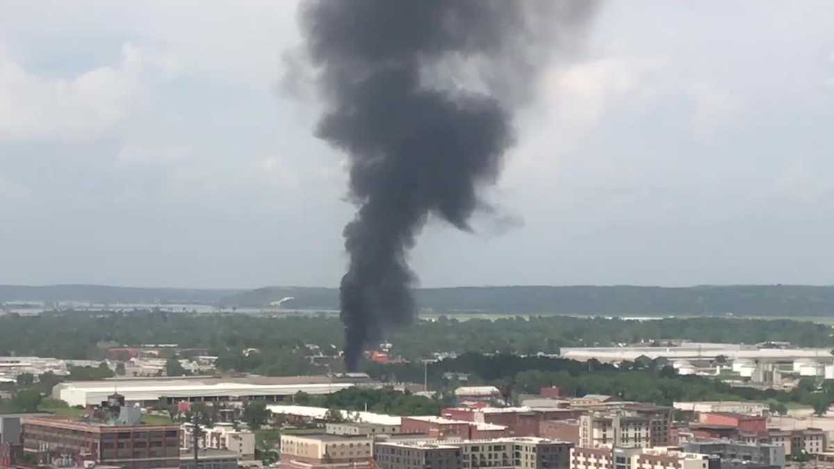 Crews continue to work on salvage yard fire Friday