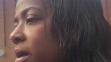 Mother of victim, Janis Brown, talks with media