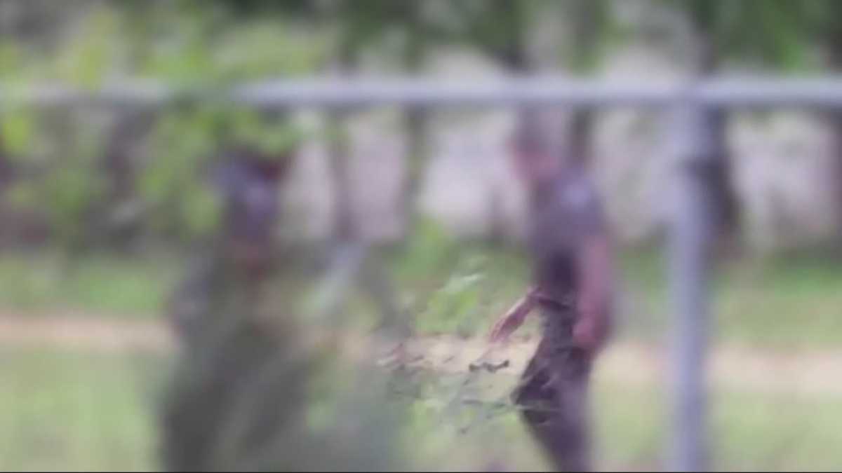 Video shows cop drop object next to body of man he shot, killed