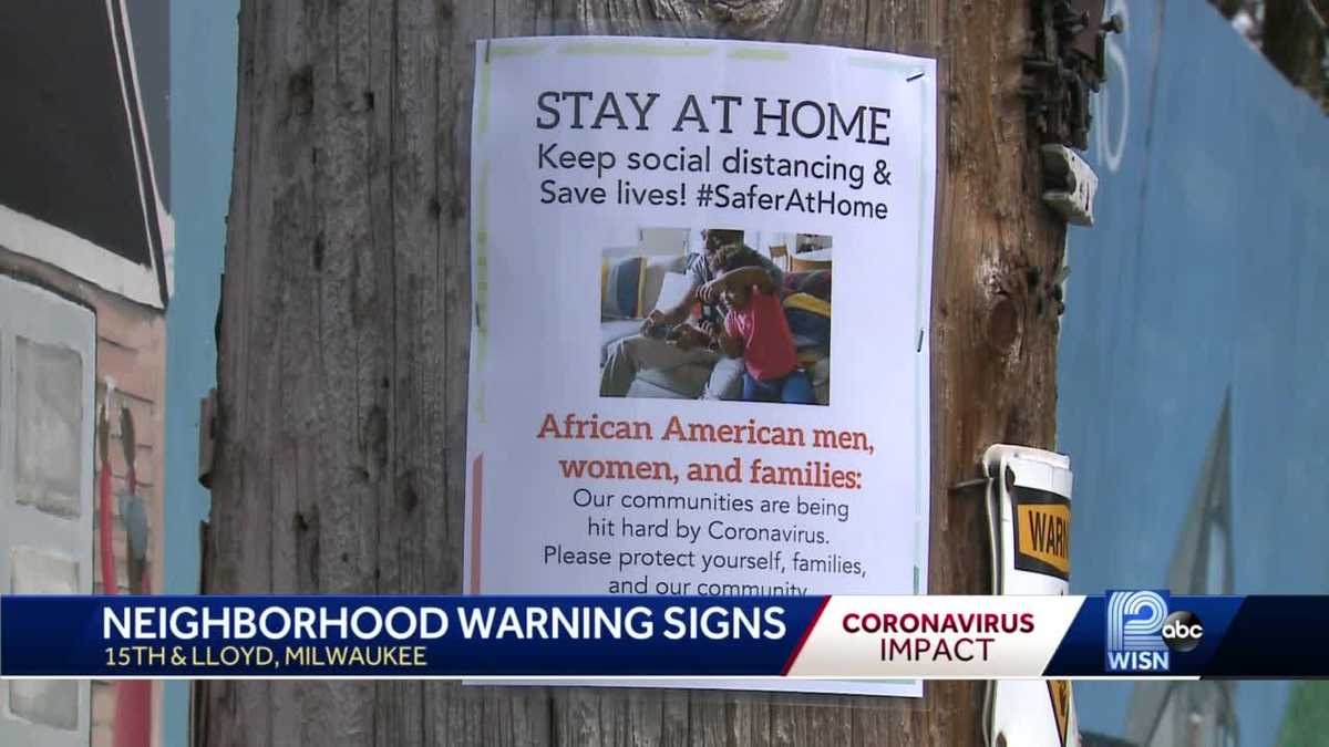 Community organization posts signs warning of coronavirus