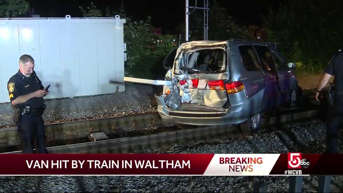 Minivan hit by commuter train