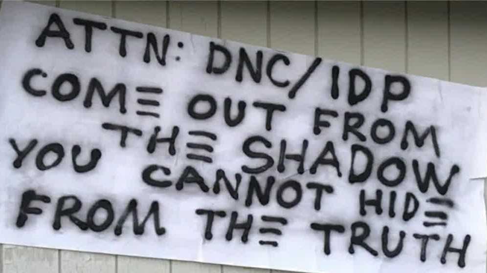Sign placed on IDP's building voices frustration over caucus results