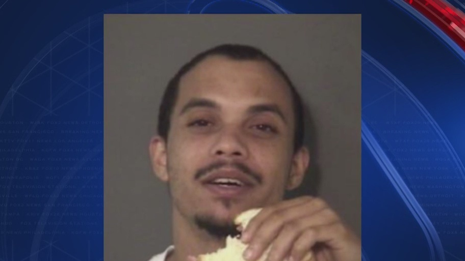 Inmate caught snacking on bologna sandwich in mugshot