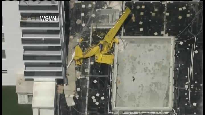 Pilot killed when plane crashes into condo building