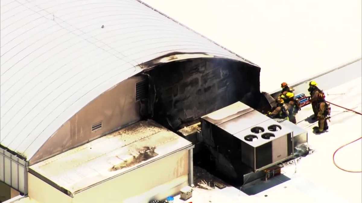 Orange County firefighters extinguish Papa John's building fire