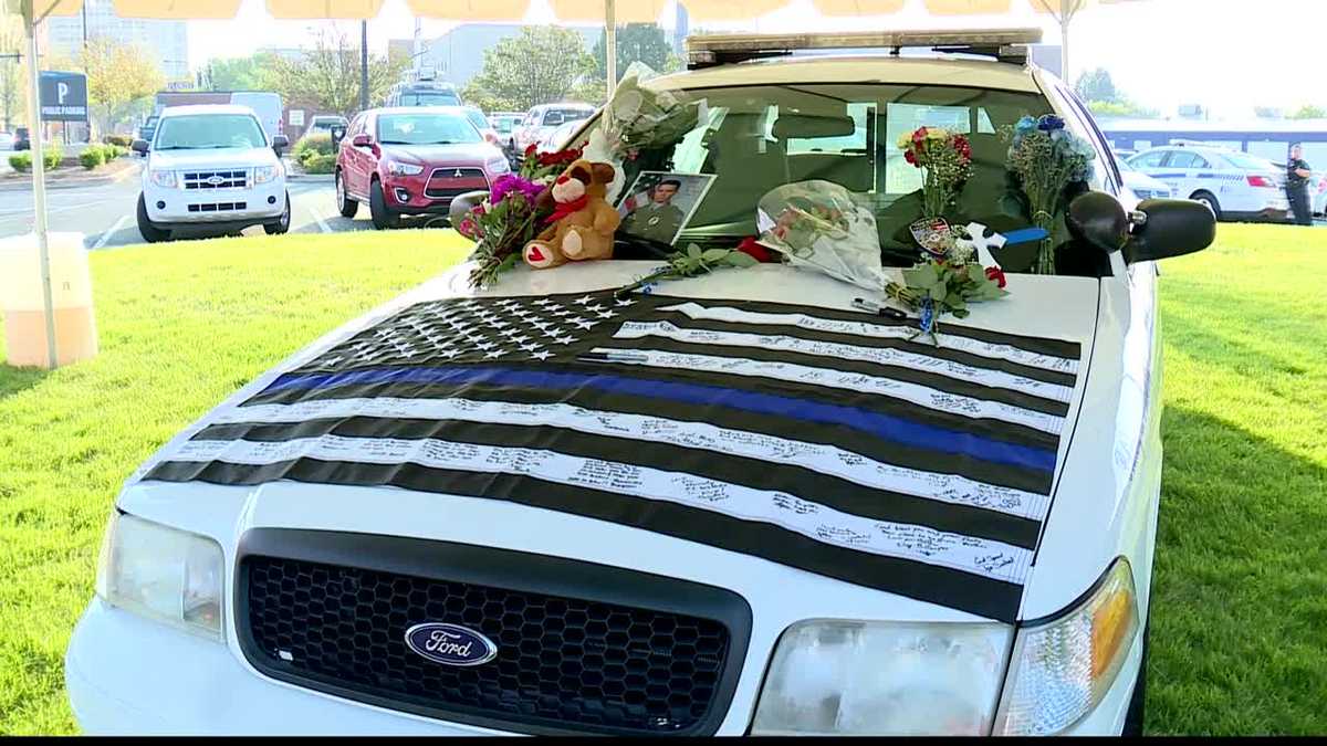 Patrol car memorial growing for fallen Officer Jason Harris