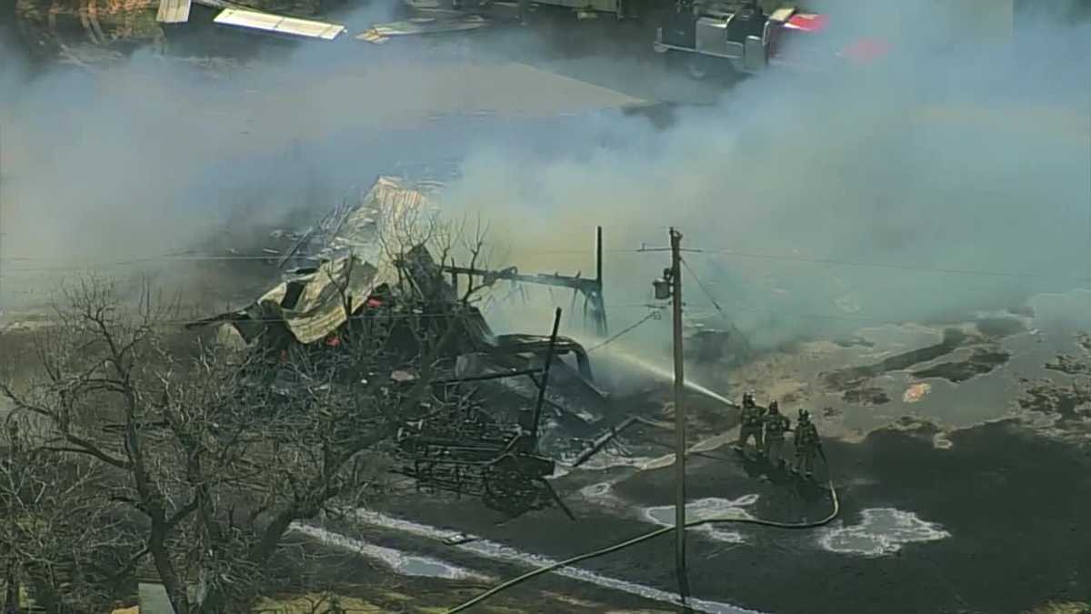 Crews battle barn fire in Yukon