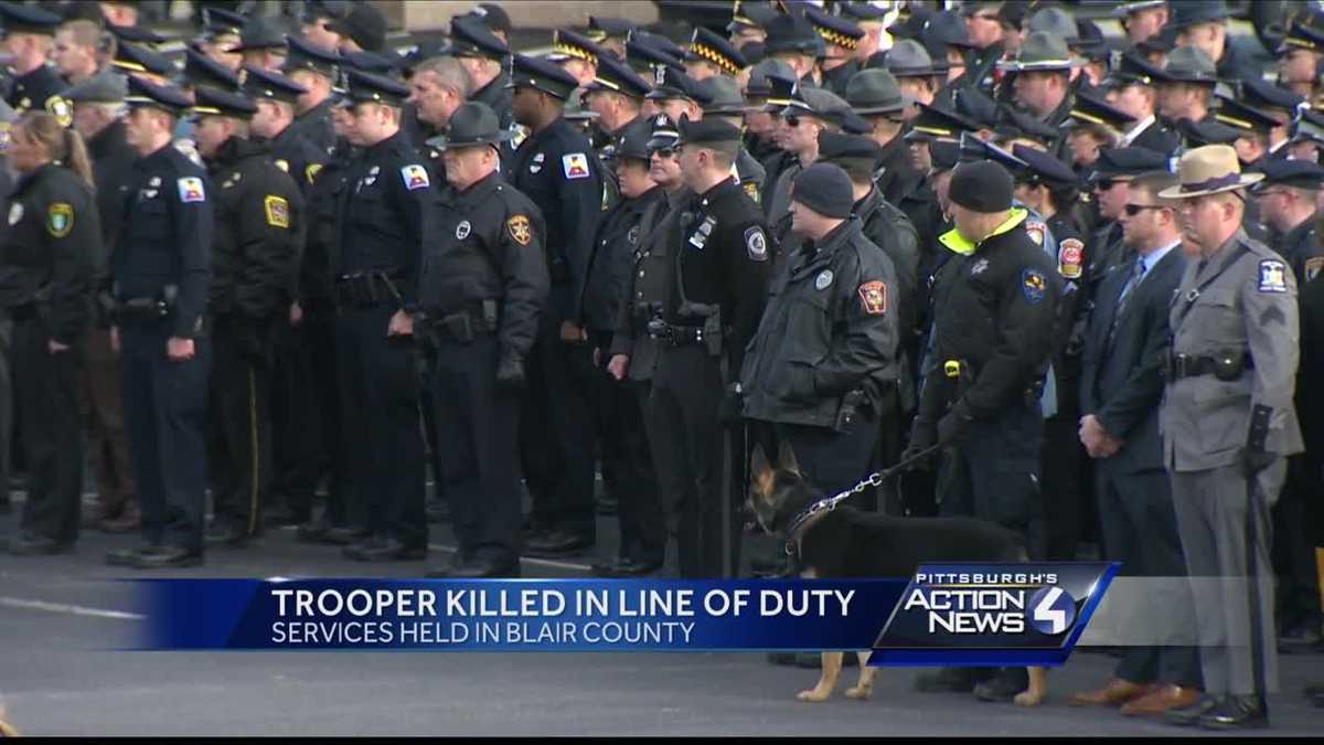 Police by the hundreds show up for rookie state trooper's funeral