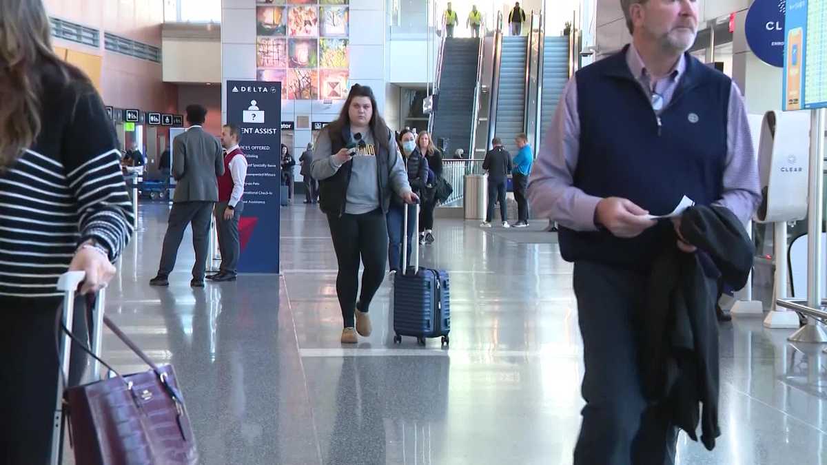 Long lines straddle local DMV's in rush for Real IDs