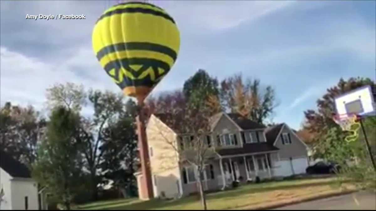 Melting hot air balloon makes emergency landing in New England