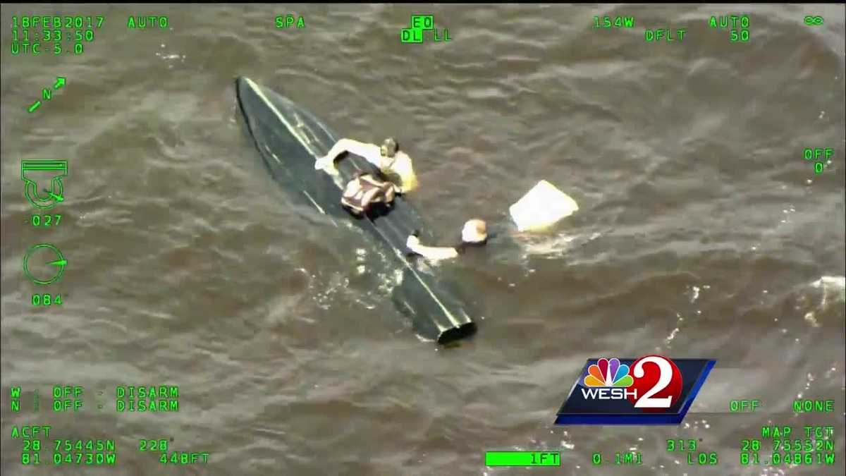2 rescued from capsized boat
