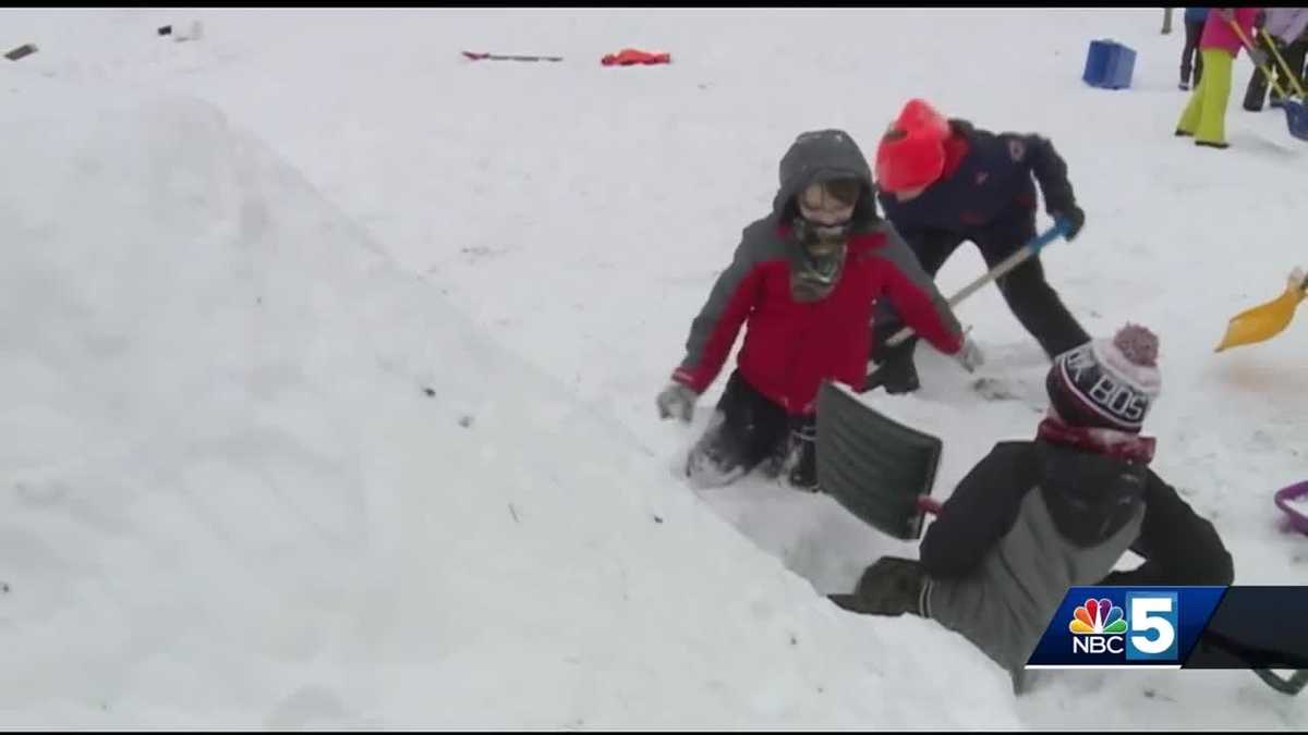 Students learn how to build snow survival shelters