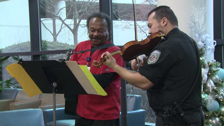 Hospital security guard spreads Christmas cheer