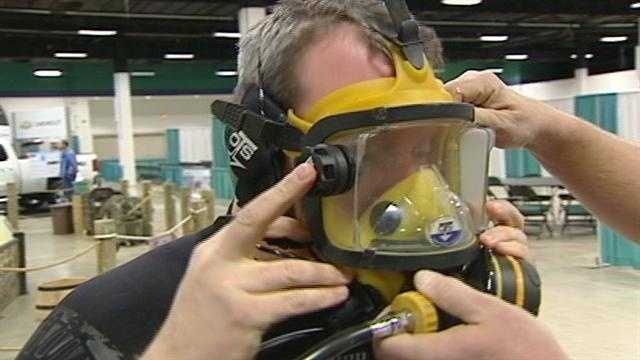Brian Slocum tries out SCUBA Diving at Greensboro Coliseum