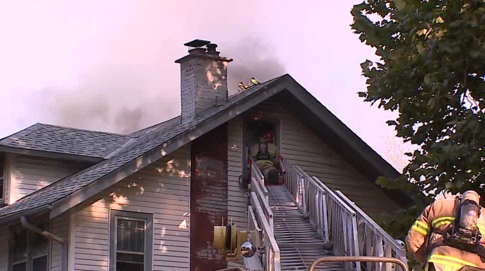 Firefighters battle weather and house fire in north Omaha